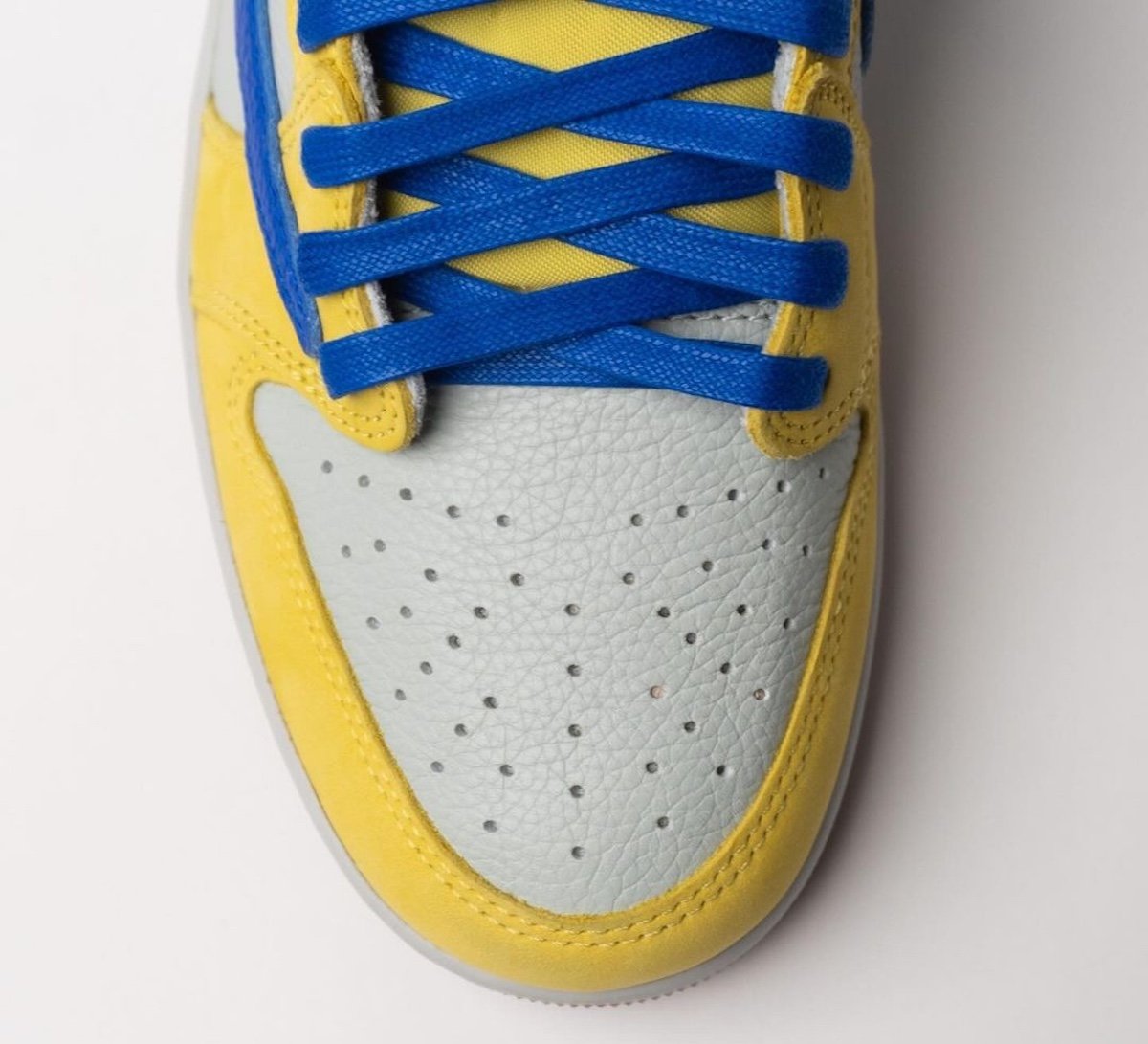 Travis Scott x Air Jordan 1 Low OG Canary DZ4137-700 | SneakerFiles